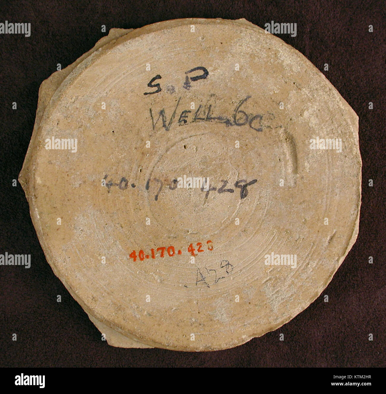 The base of a Buff Ware vessel, accession number MET wb 40.170.428b, is ...