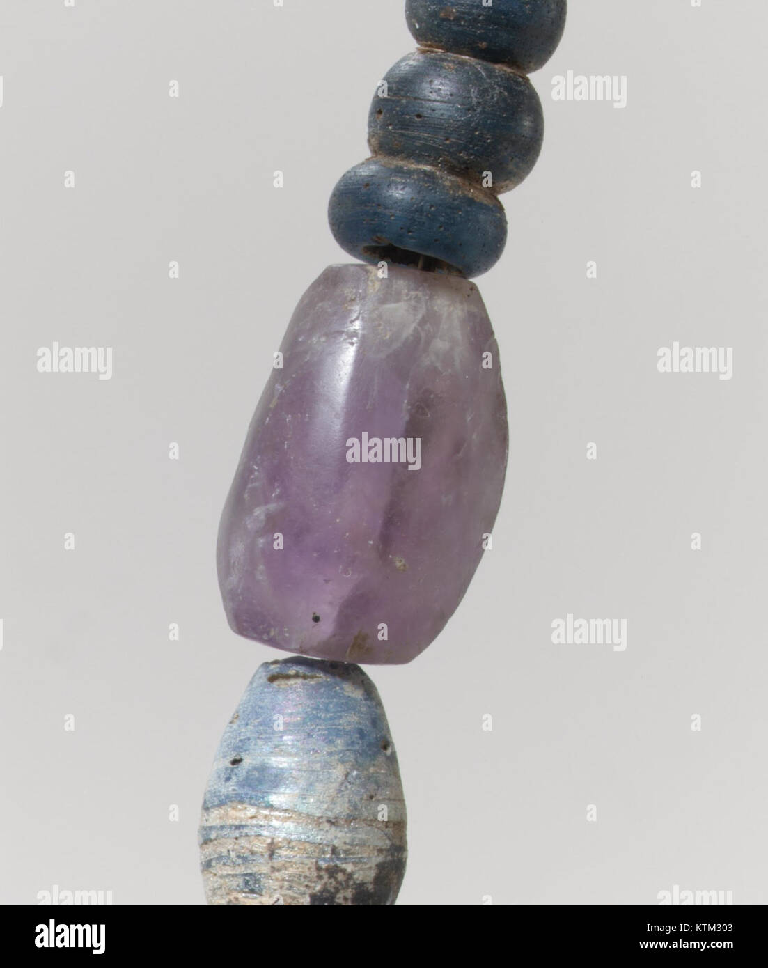 These beads are part of a necklace in the collection of The ...