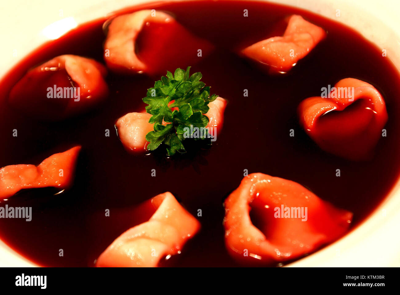 Barszcz z uszkami is a traditional Polish dish, a beetroot soup served ...