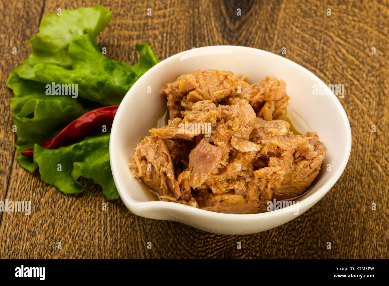 Canned tuna fish in the bowl ready for cooking Stock Photo - Alamy