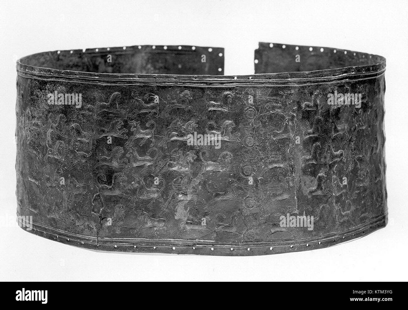 This ancient belt features intricate scenes depicting bull and lion ...
