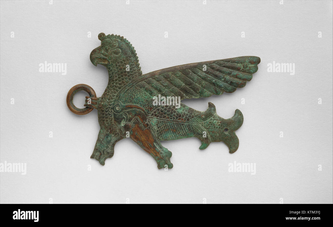 The belt ornament, shaped like a bird demon, is a metal artifact housed ...