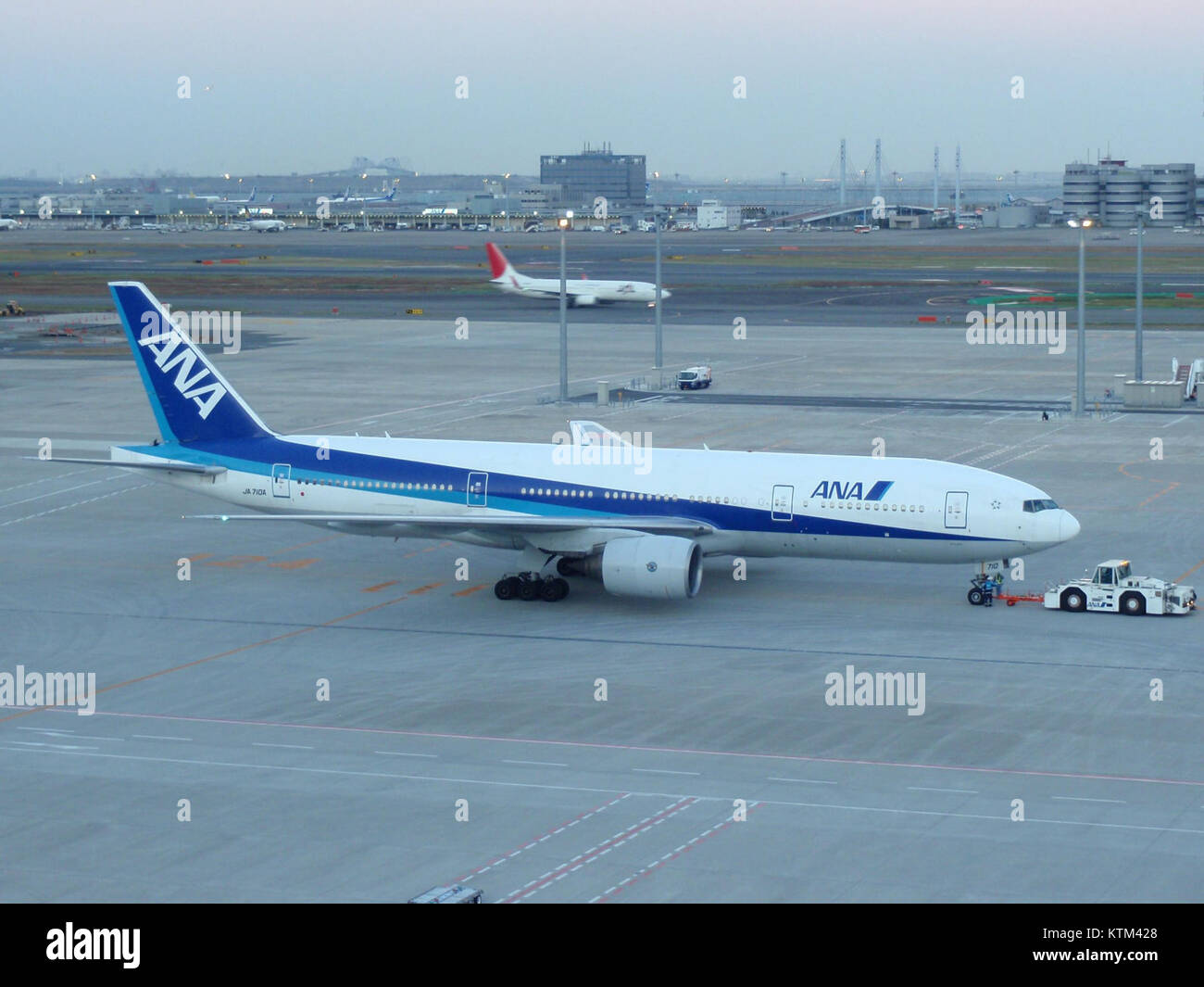 A photograph of a Boeing 777-281ER, registration JA710A, at Haneda ...