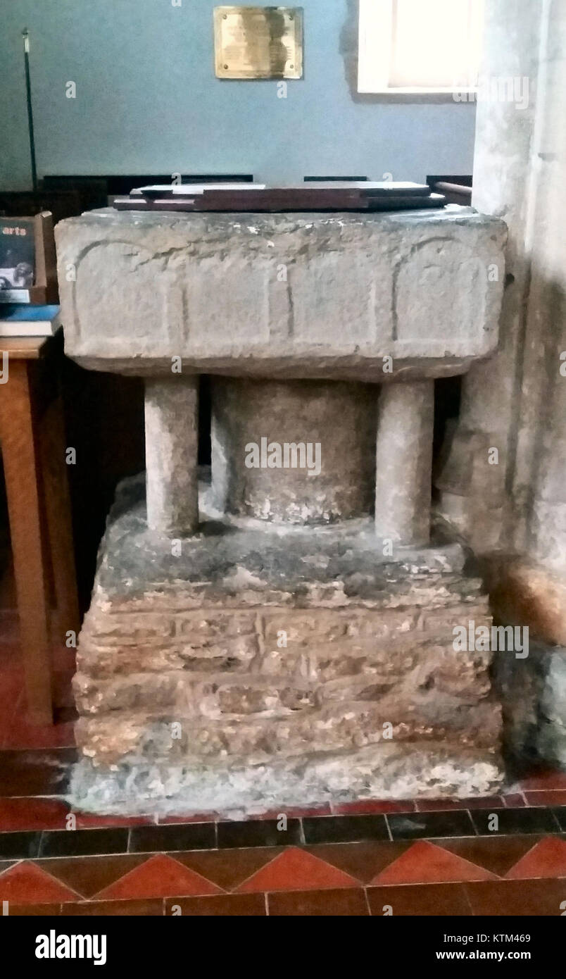 An image of the baptismal font in St. Peter's Church in Shirwell ...