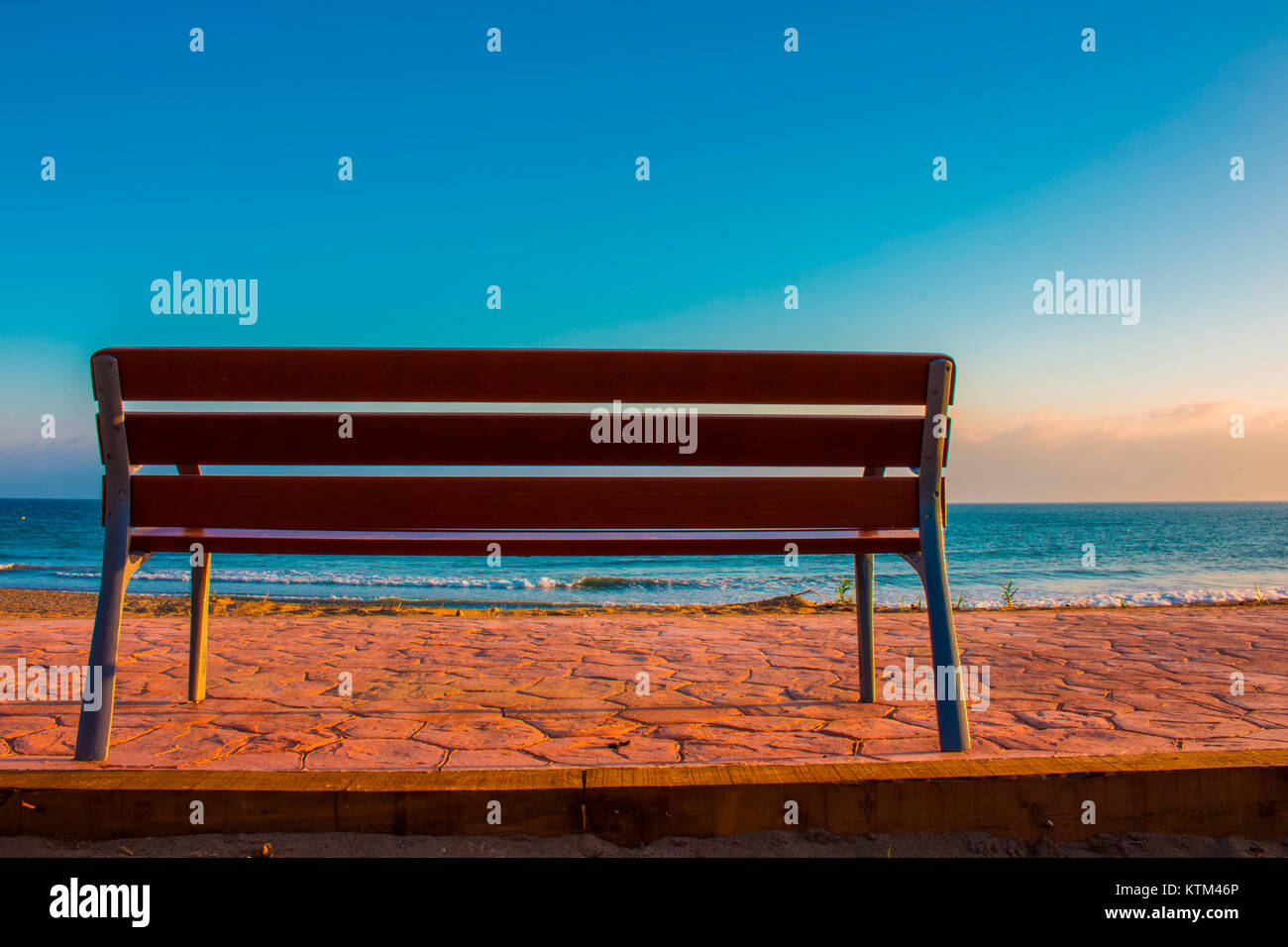 Bench. Wooden bench in the beach. Costa del Sol, Andalusia, Spain Stock ...
