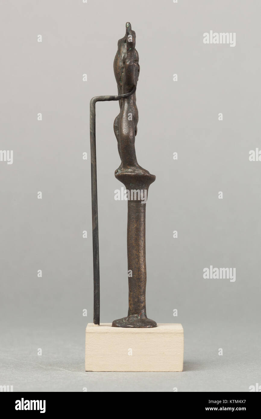 This ancient Egyptian sculpture of the god Bes depicts him standing on ...