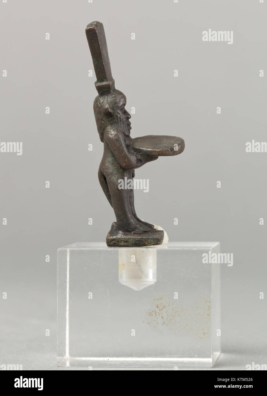 This artwork, titled 'Bes with a Tambourine,' features the ancient ...