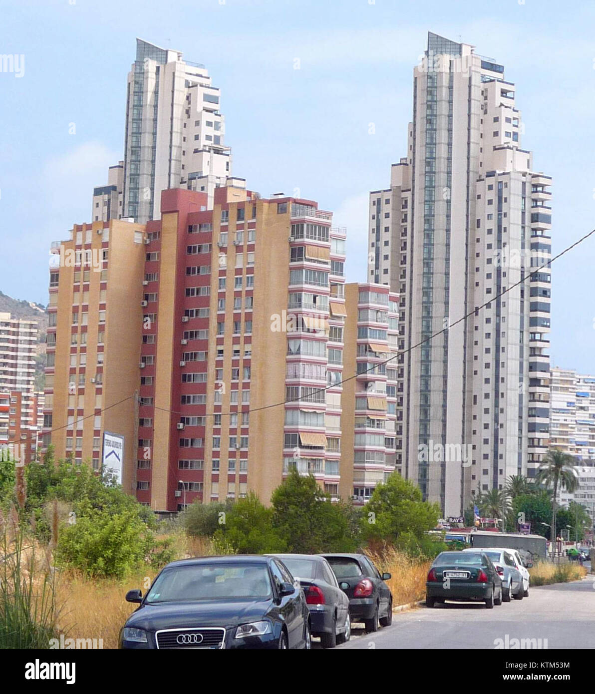 A photograph showcasing the Gemelos 26 skyscrapers in Benidorm, Spain ...