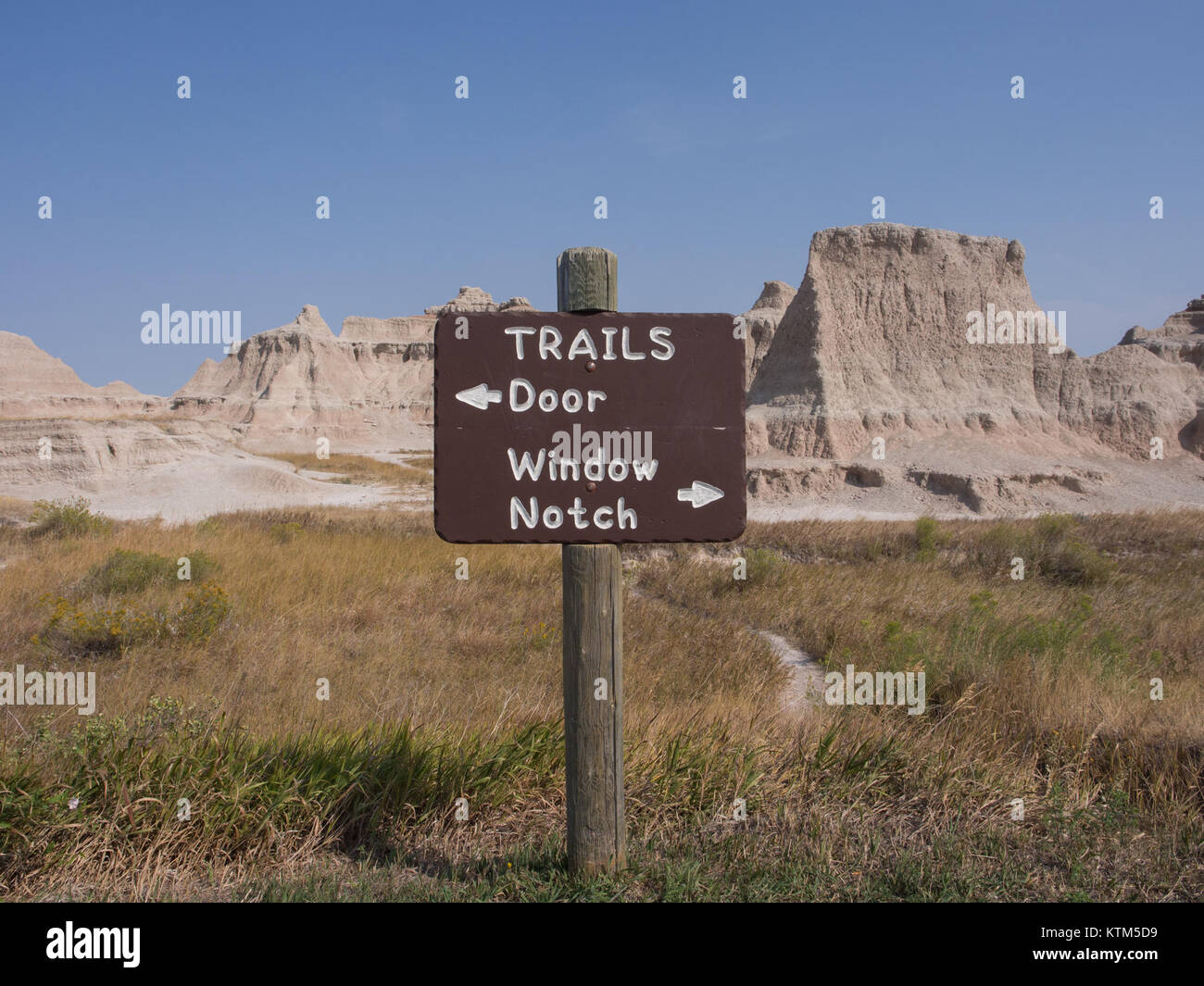 Badlands National Park Door, Window, and Notch Trails Sign Stock Photo ...