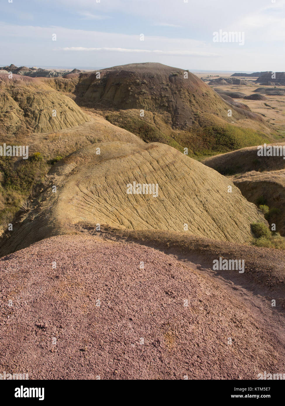 The Yellow Mounds of Badlands National Park in South Dakota are a ...