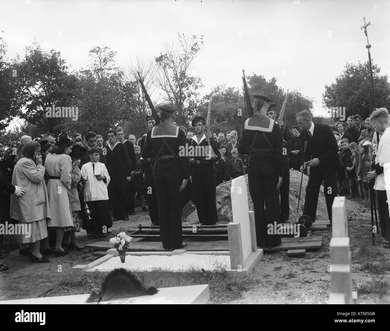 This photograph depicts the funeral of Nicolai Vlieger, a student from ...