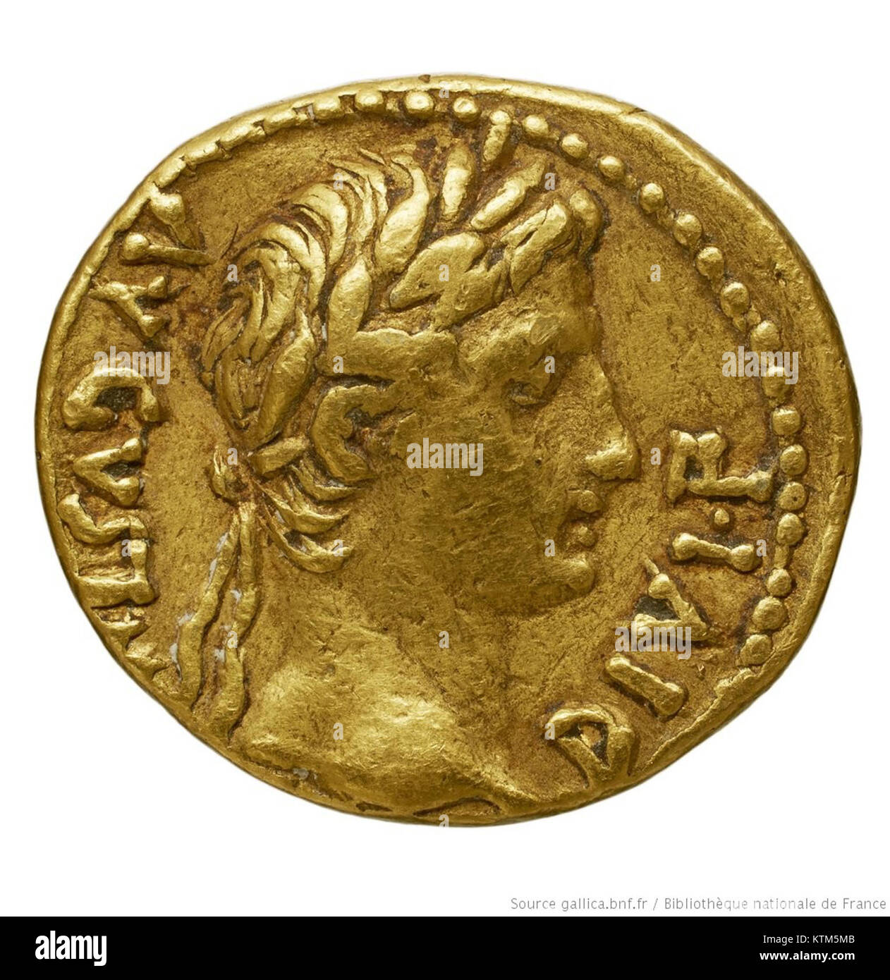 This image features a golden coin (Aureus) from the reign of the Roman ...
