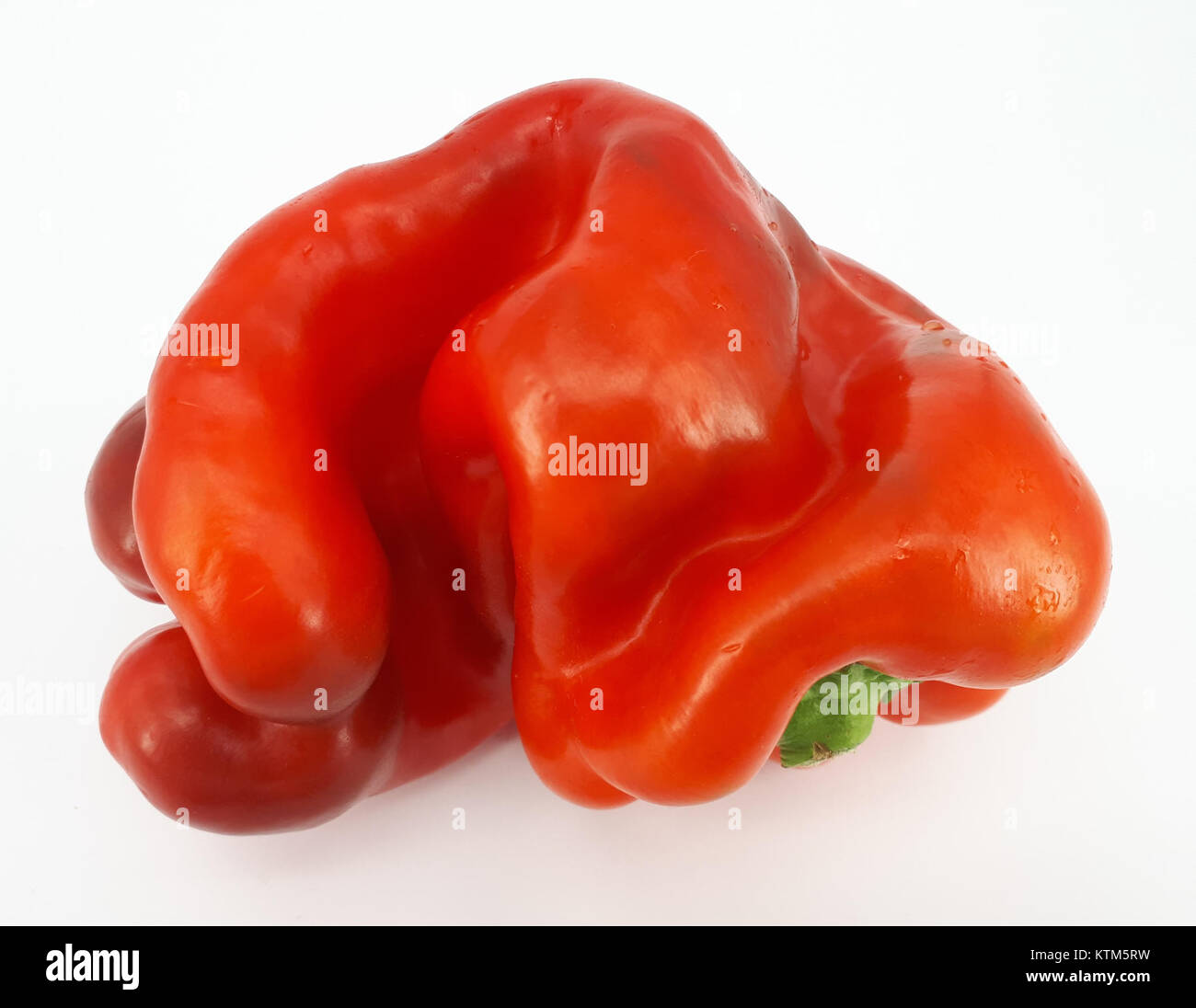 The bent red bell pepper, photographed in 2017, showcases an unusual ...