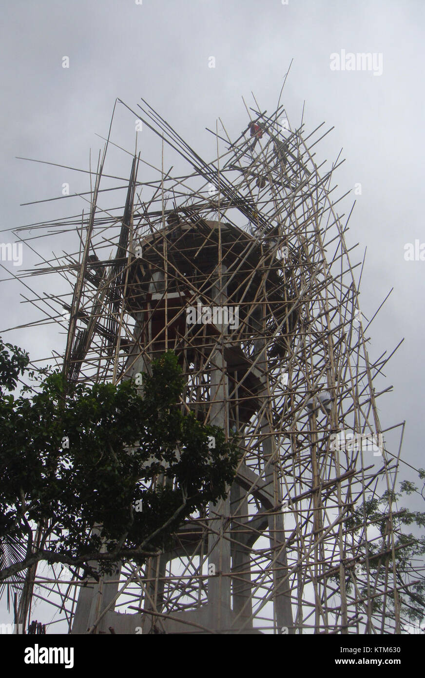 Bamboo scaffolding around a water tower Stock Photo - Alamy