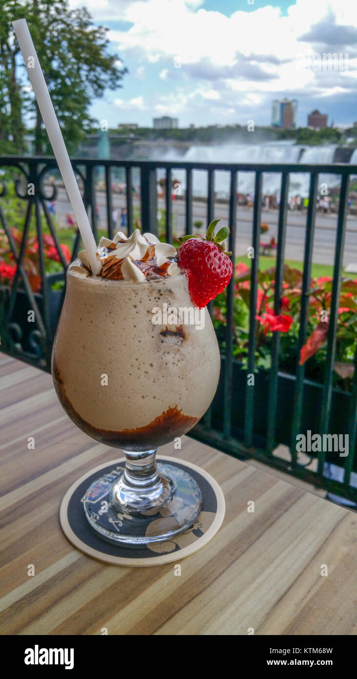 Glass of milkshake Stock Photo - Alamy