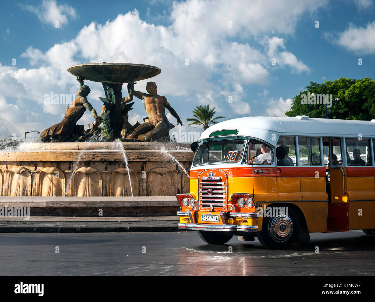 vintage orange british bedford buses on street of la valletta old town ...