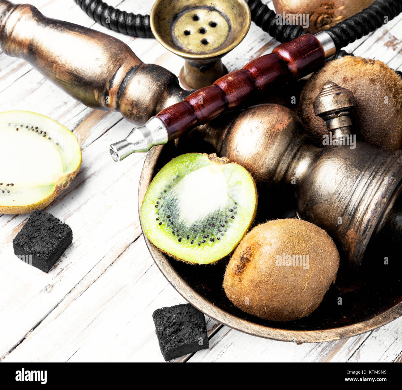 smoking hookah in Arabic style with the tobacco aroma kiwi Stock Photo ...