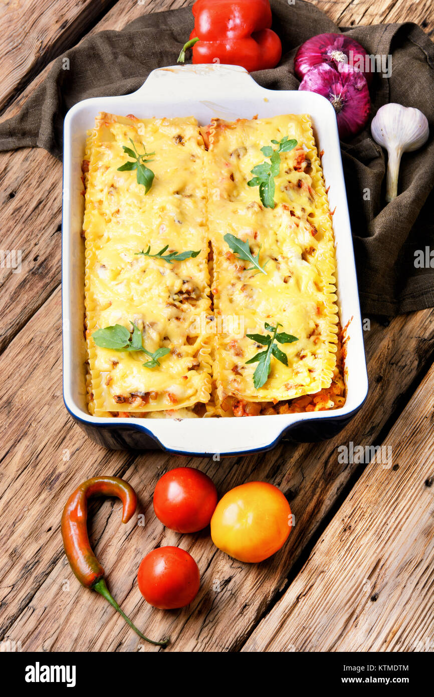 Traditional italian lasagne food, in a baking dish Stock Photo - Alamy