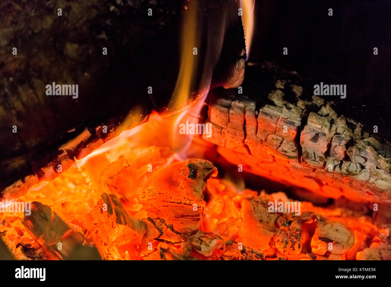 Fire fireplace ember wood home Embers closeup. Glowing embers in hot ...