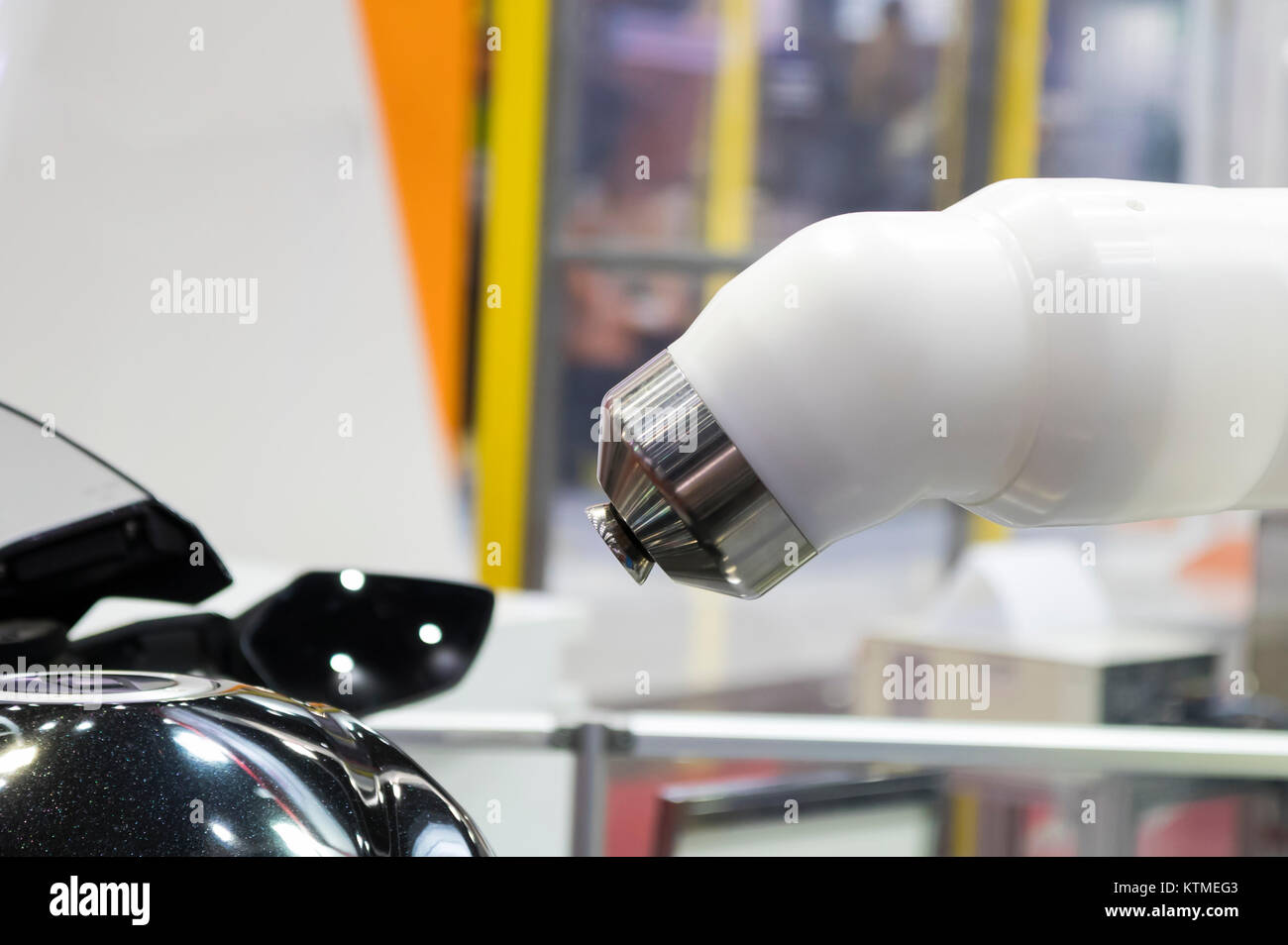 Spray painting robot and body part ; close up Stock Photo - Alamy