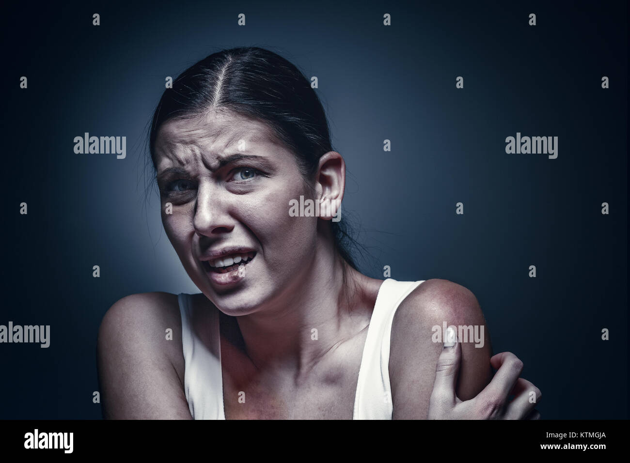 Close up portrait of a crying woman with bruised skin and black eyes ...