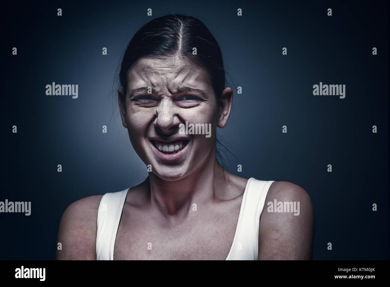 Defensive expression hi-res stock photography and images - Alamy