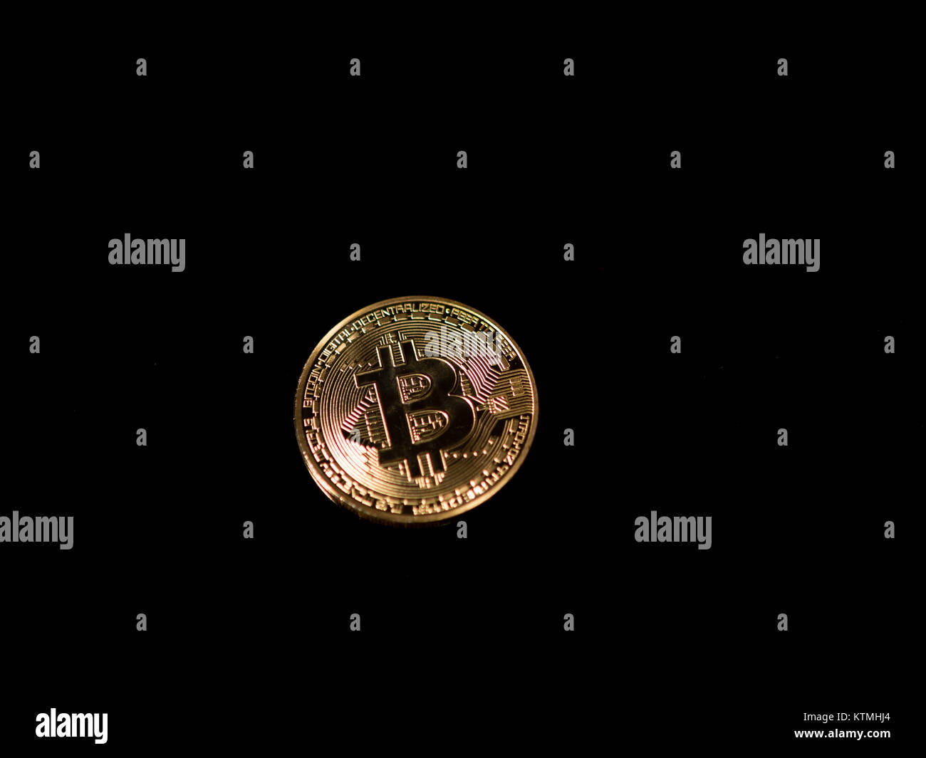 Bitcoin on black background Stock Photo - Alamy