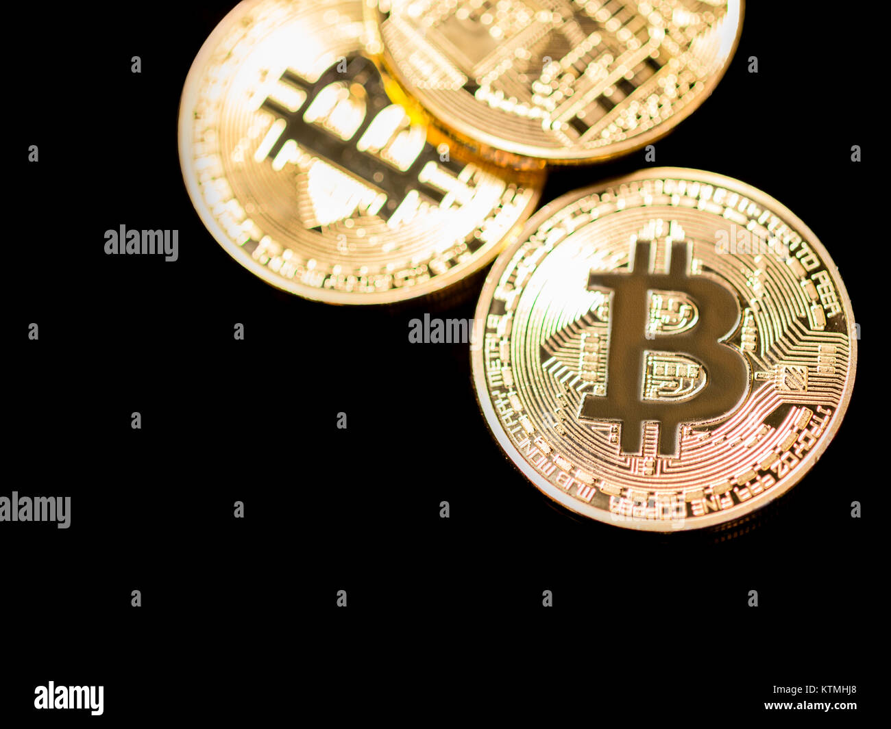 Bitcoin on black background Stock Photo - Alamy