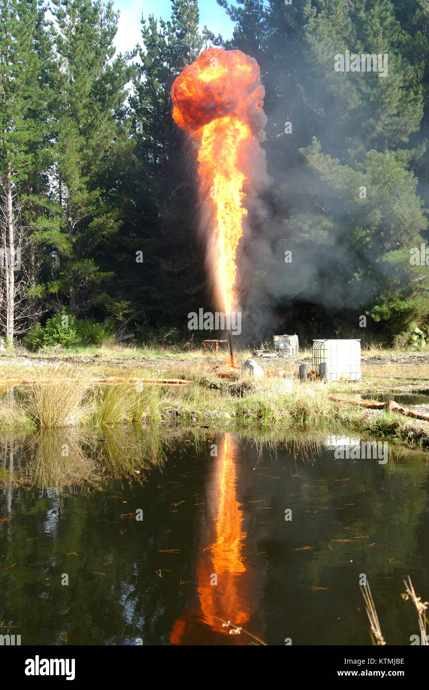 Flare burning off gas and oil at Niagara 1 oil well, West Coast, South ...
