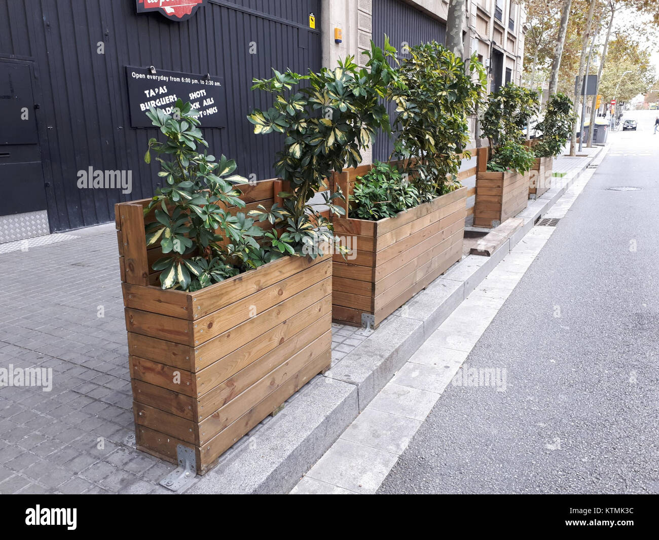 Barcelona's wooden planters, designed for urban spaces, provide an ...