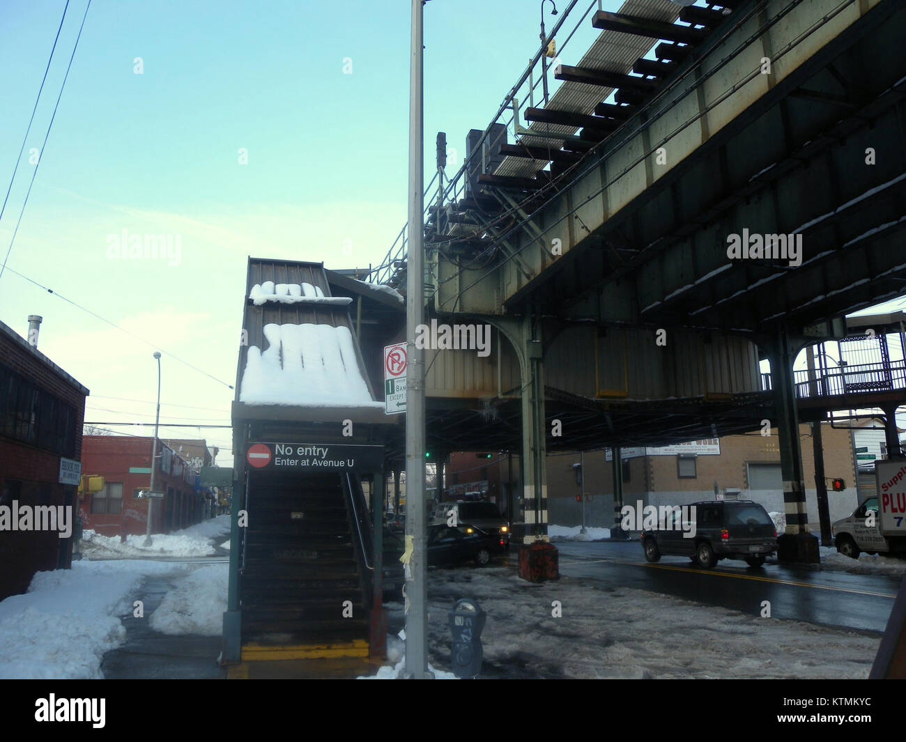 A photograph of snow accumulation at the exit of U Culver Station ...