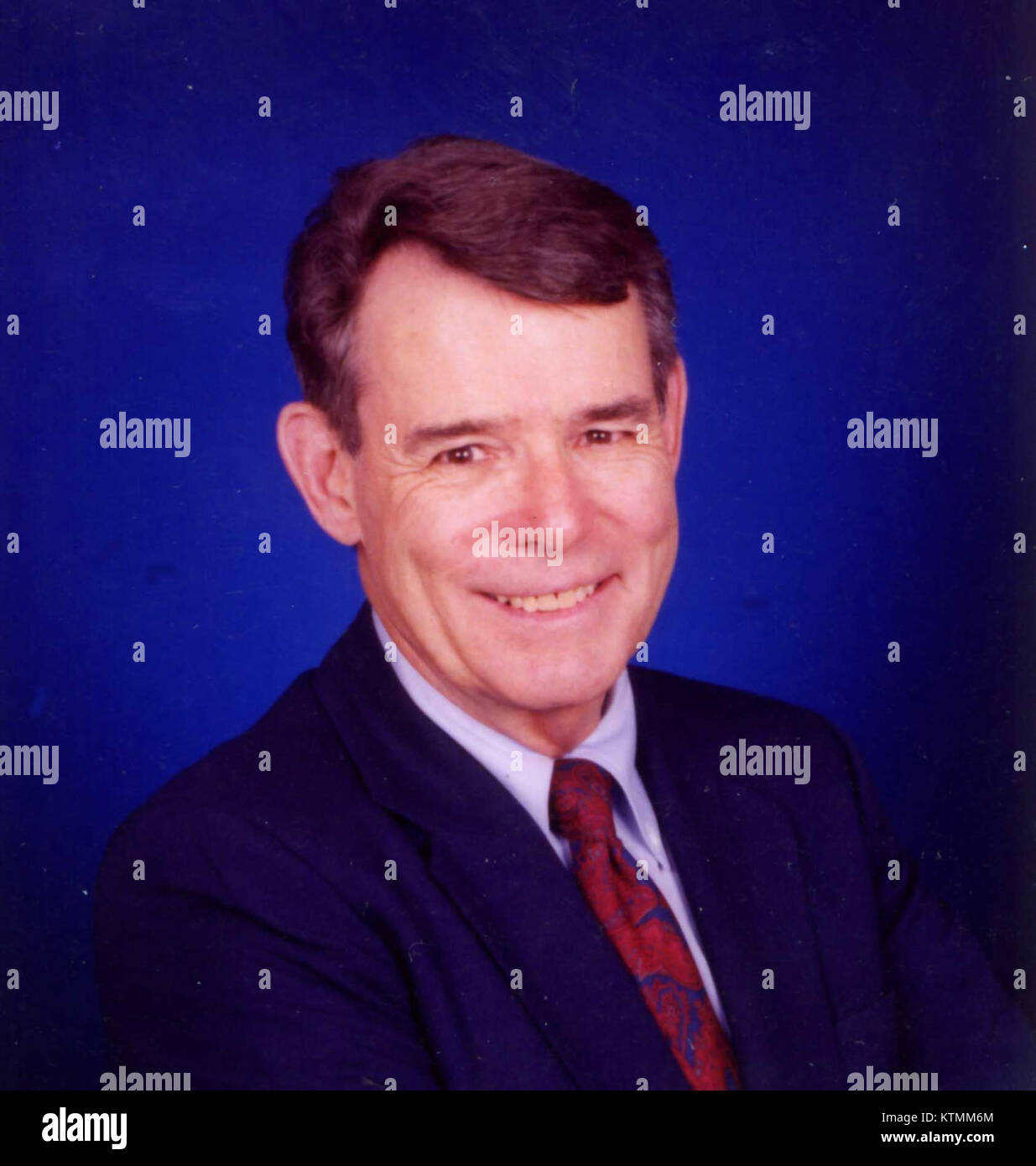 This is an obituary photograph for an individual, providing a ...