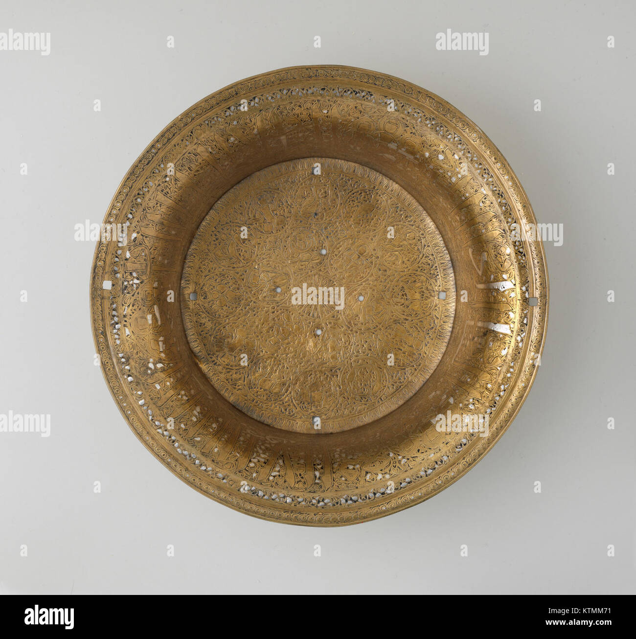 This decorative basin features zodiac signs and royal titles ...