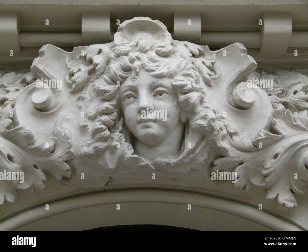 This bas relief, located in Paris, is a detailed stone carving ...