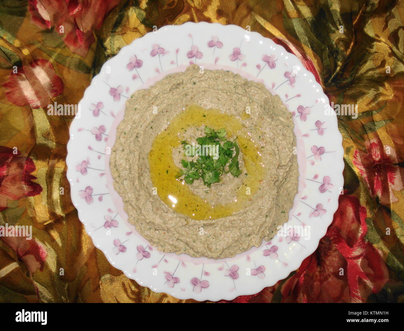 Baba Gonoush is a traditional Levantine dish made from mashed eggplant ...
