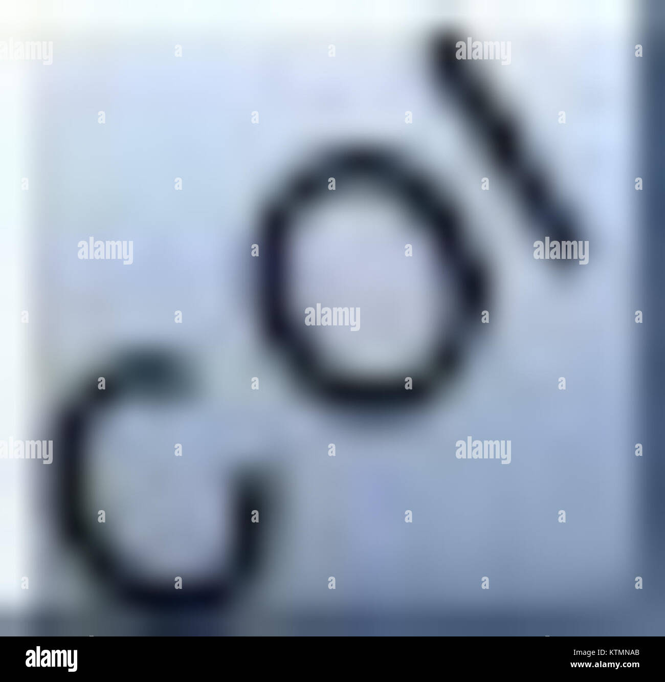 A button with a COI (Country of Origin) marking, representing a ...