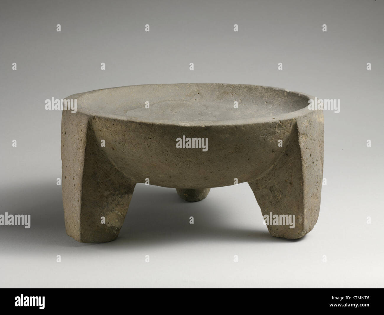 This basalt tripod vessel or mortar, part of the Metropolitan Museum of ...