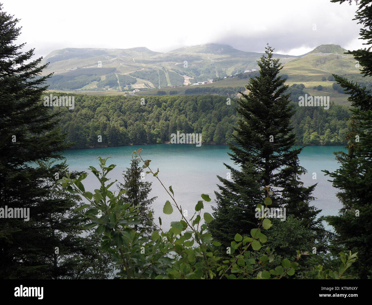 Lac Pavin is a volcanic lake located in the Auvergne region of France ...