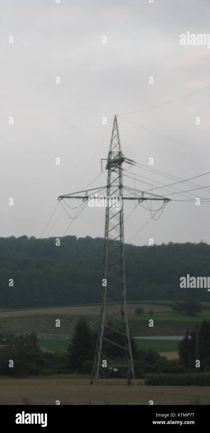 This image features the Bahnstrom Abzweigmast, a railway infrastructure ...