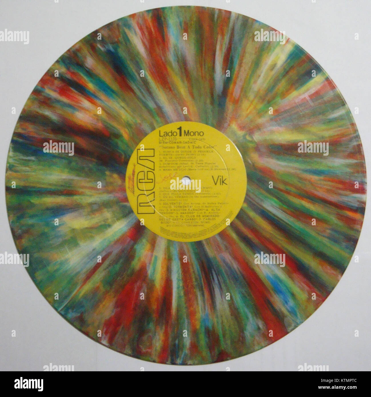 This colorful vinyl record features a vibrant design, showcasing the ...