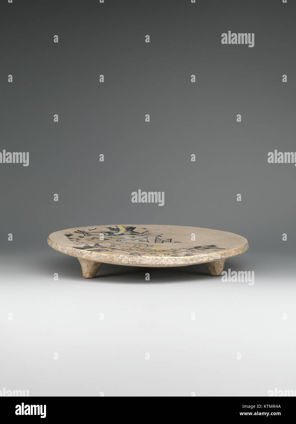 The base of a footed buff ware vessel is an artifact from ancient ...