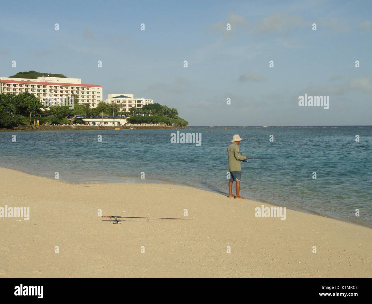 This photograph captures Tumon Bay in Guam, showcasing its pristine ...