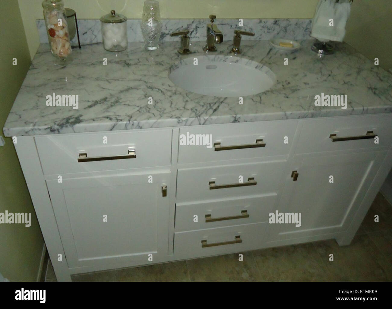Bathroom vanity cabinet including sink and drawers Stock Photo - Alamy