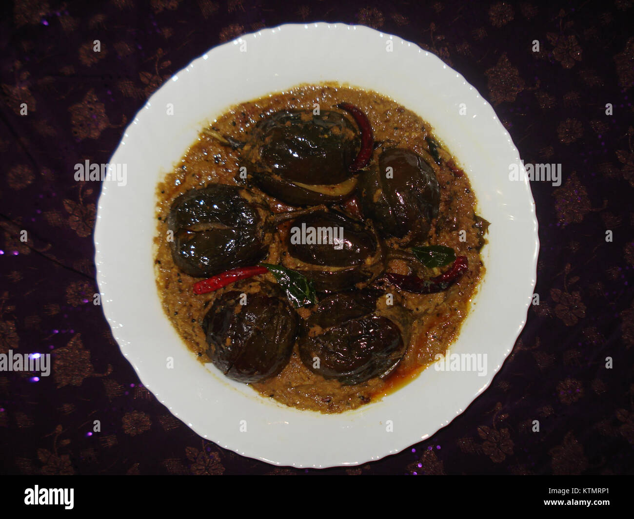Baghare Baingan is a traditional Indian dish made with eggplant, often ...