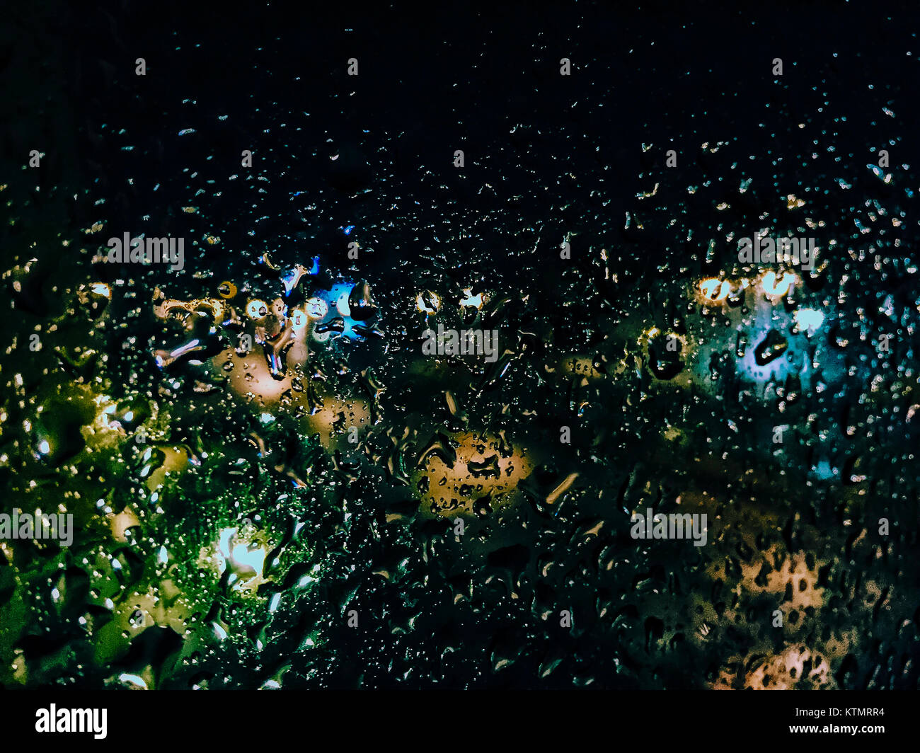 Rain. Rain drops on the window. Night Stock Photo - Alamy