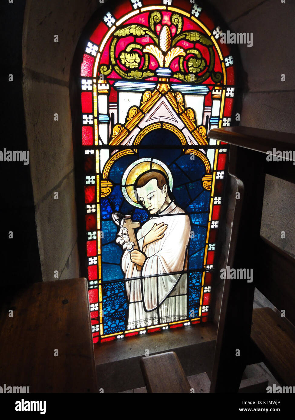 Refers to a stained-glass window in Bassussarry, France, depicting a ...