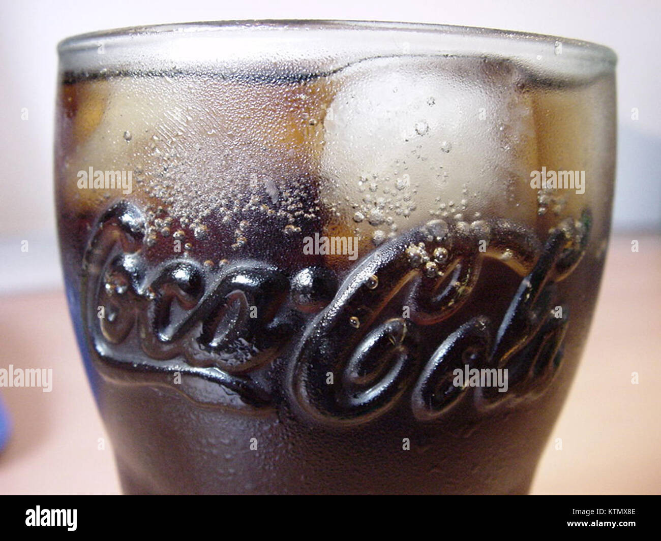 Coca-Cola glass with ice represents the classic serving style of the ...