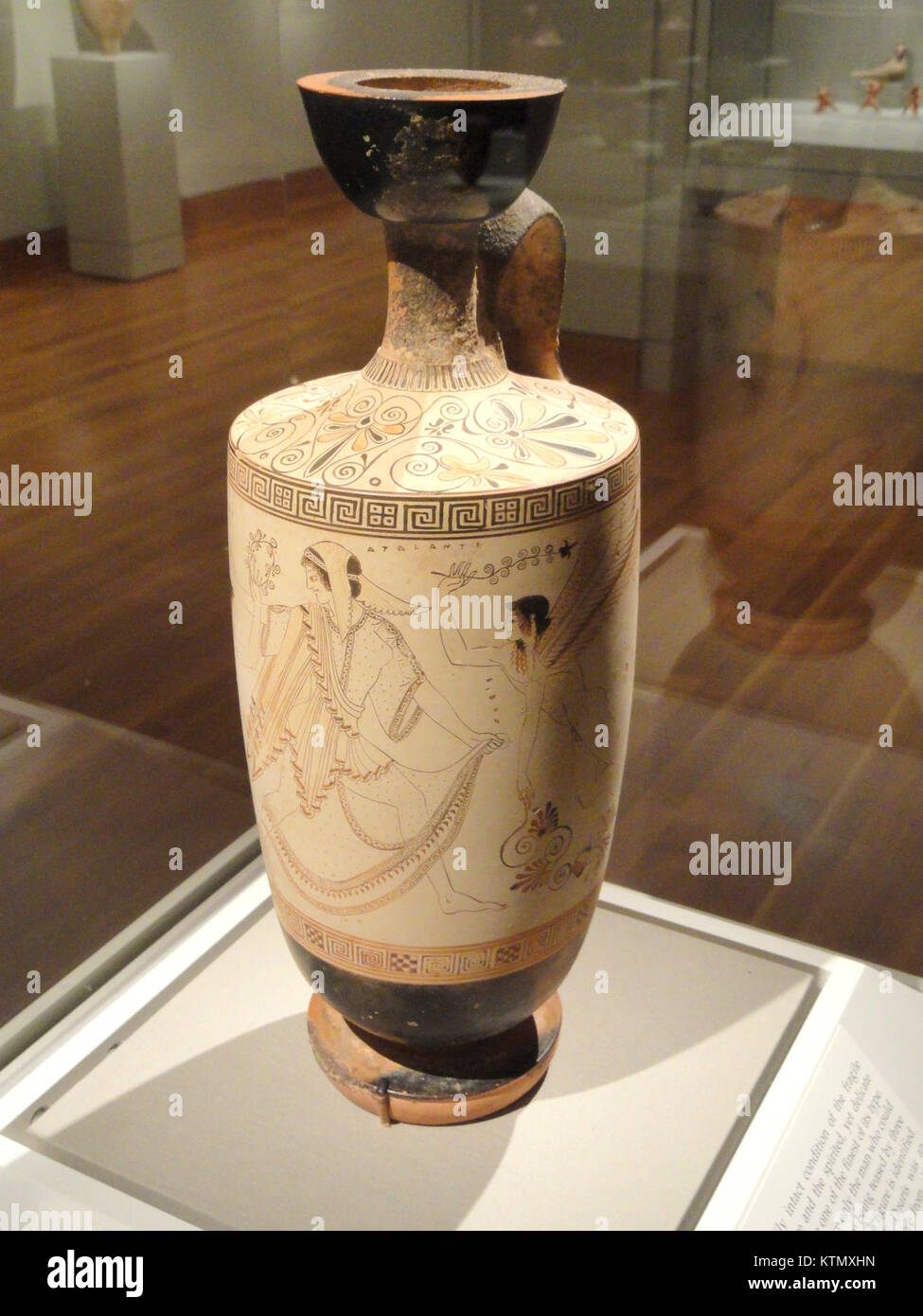 This image features an Attic lekythos, a type of ancient Greek ceramic ...