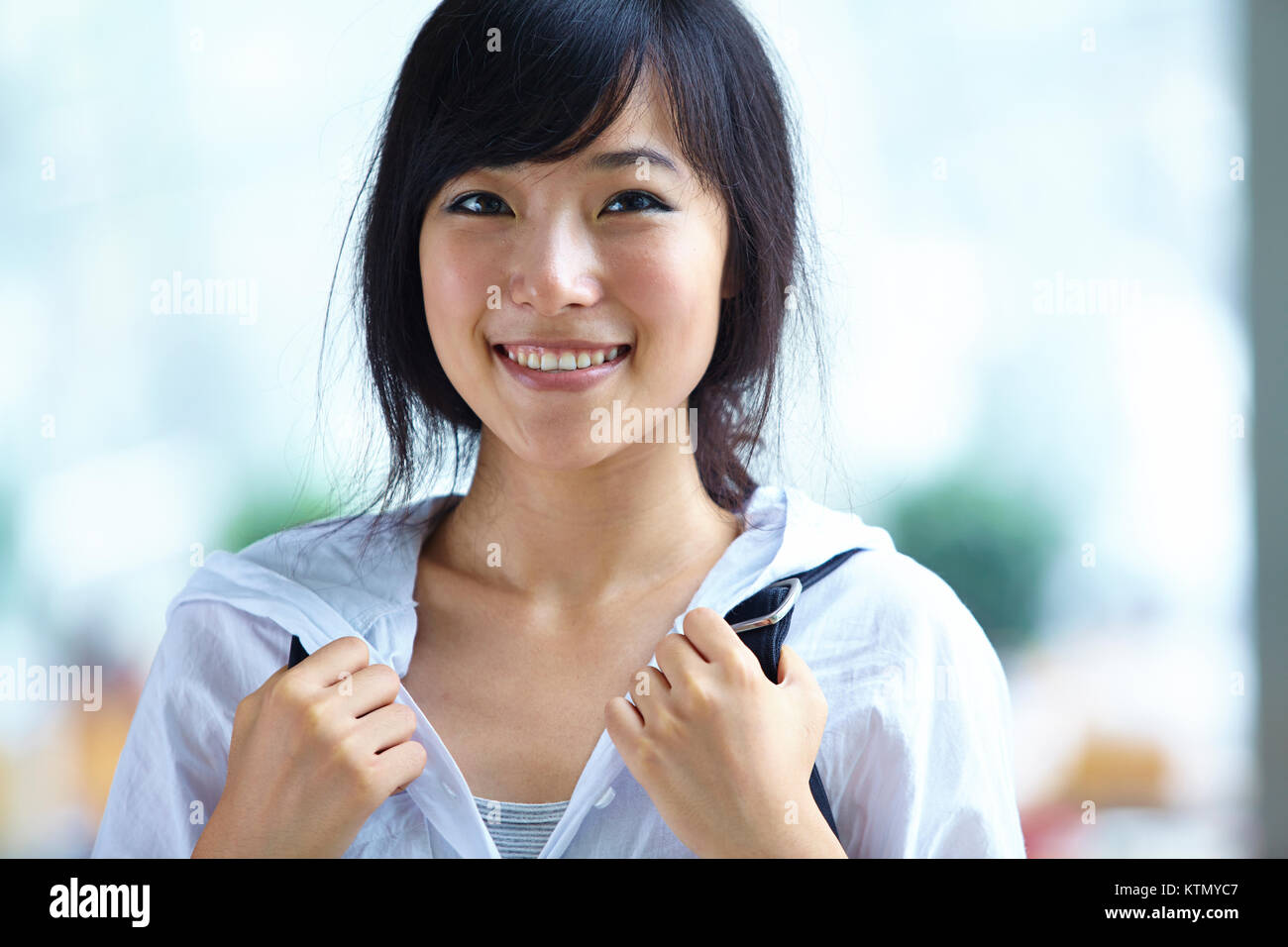 one pretty young Chinese college student portrait Stock Photo - Alamy