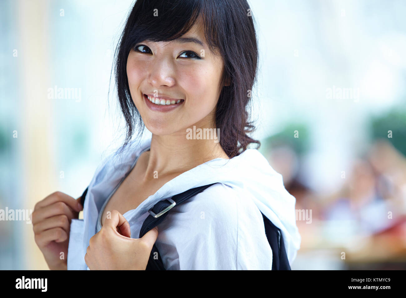 one pretty young Chinese college student portrait Stock Photo - Alamy
